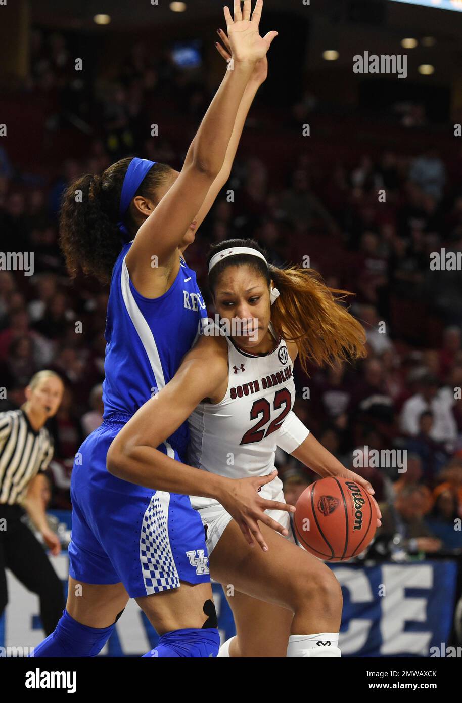 South Carolina forward A'ja Wilson (22) drives around Kentucky center ...