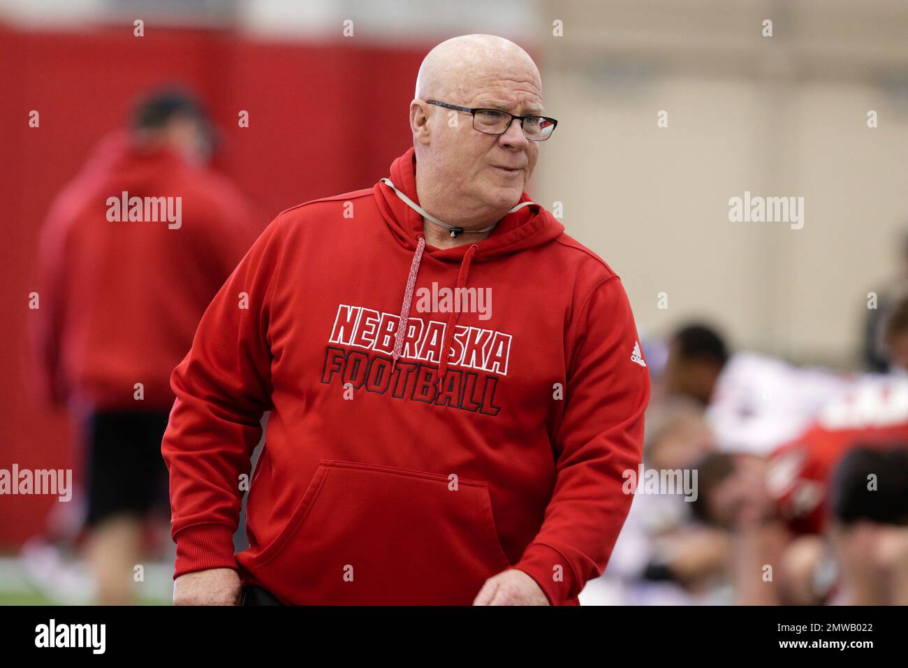 Nebraska offensive line coach Mike Cavanaugh follows warmups on the ...