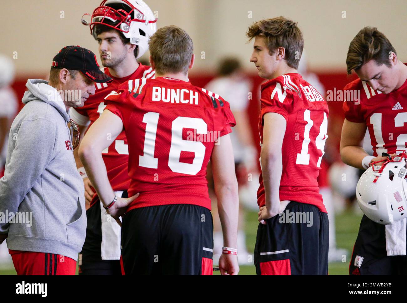 Nebraska head coach Mike Riley, left, stands with quarterbacks Tanner ...