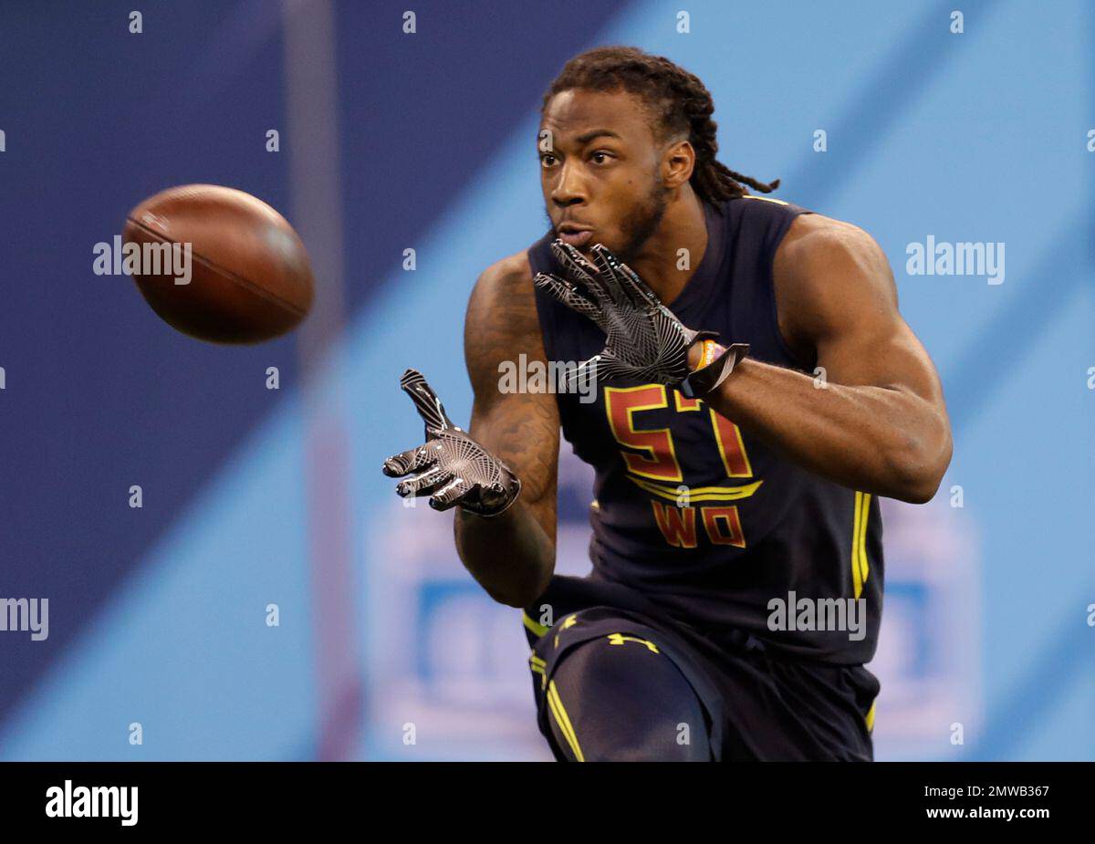 Clemson wide receiver Mike Williams runs a drill at the NFL football ...