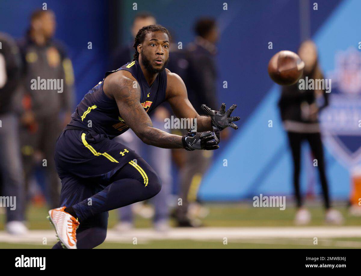 Clemson wide receiver Mike Williams runs a drill at the NFL football ...