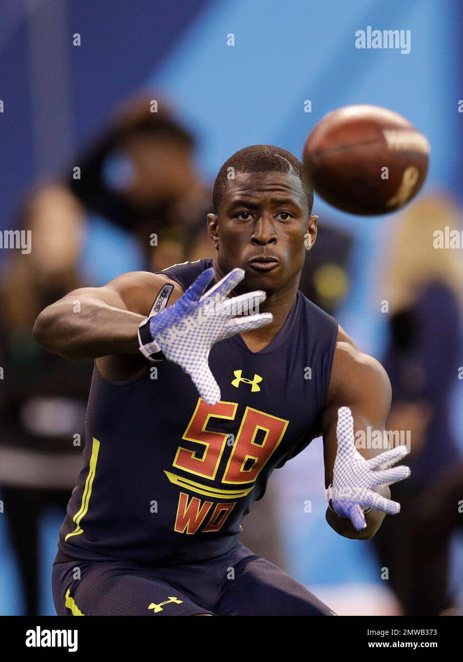 Florida State wide receiver Jesus Wilson runs a drill at the NFL ...