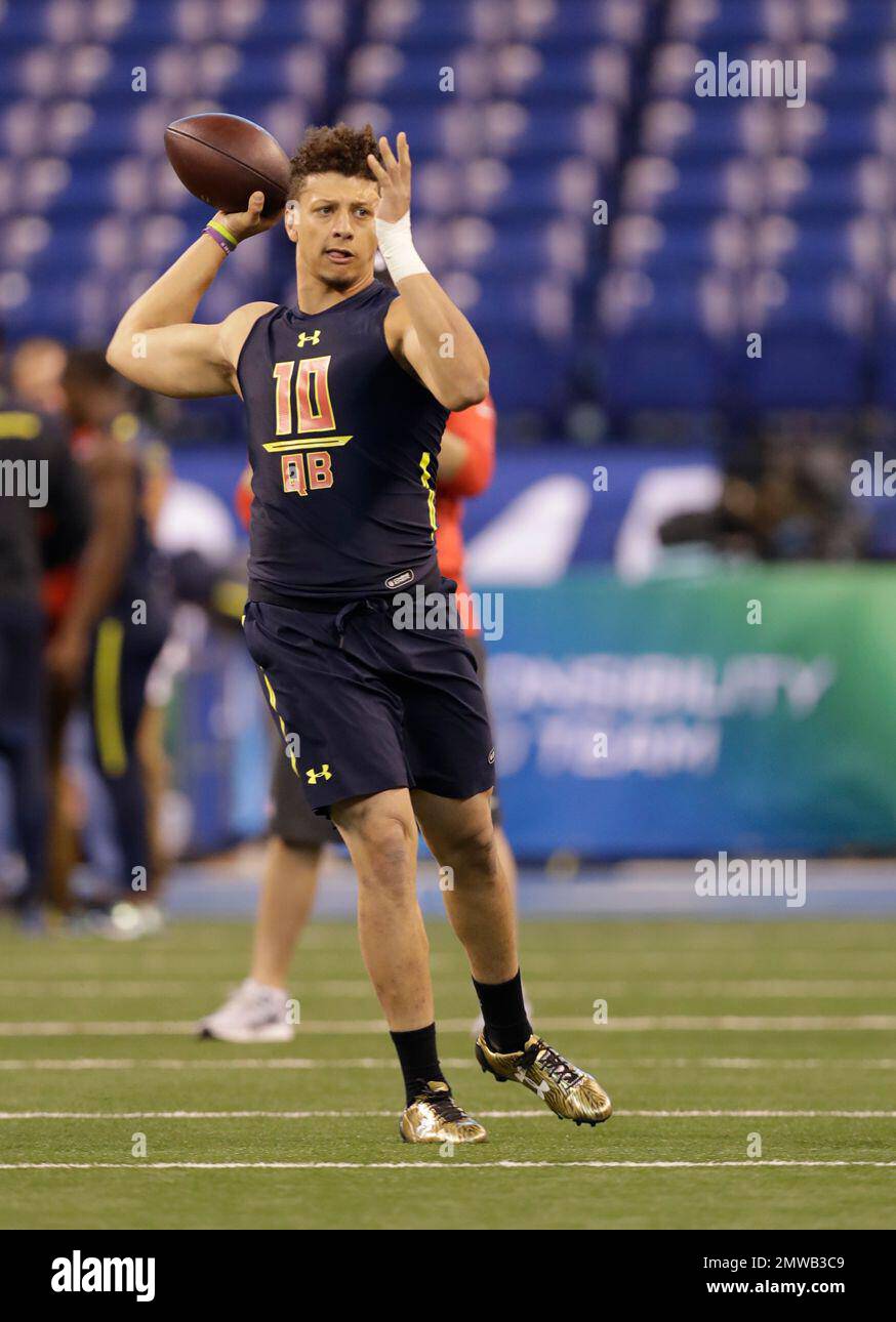 Texas Tech quarterback Patrick Mahomes runs a drill at the NFL football scouting combine ...