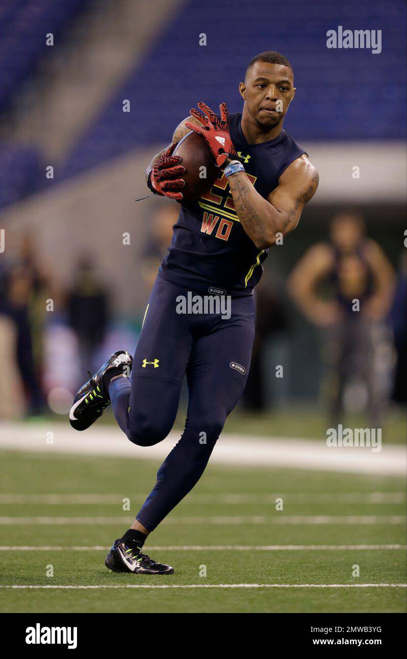 North Carolina wide receiver Bug Howard runs a drill at the NFL ...