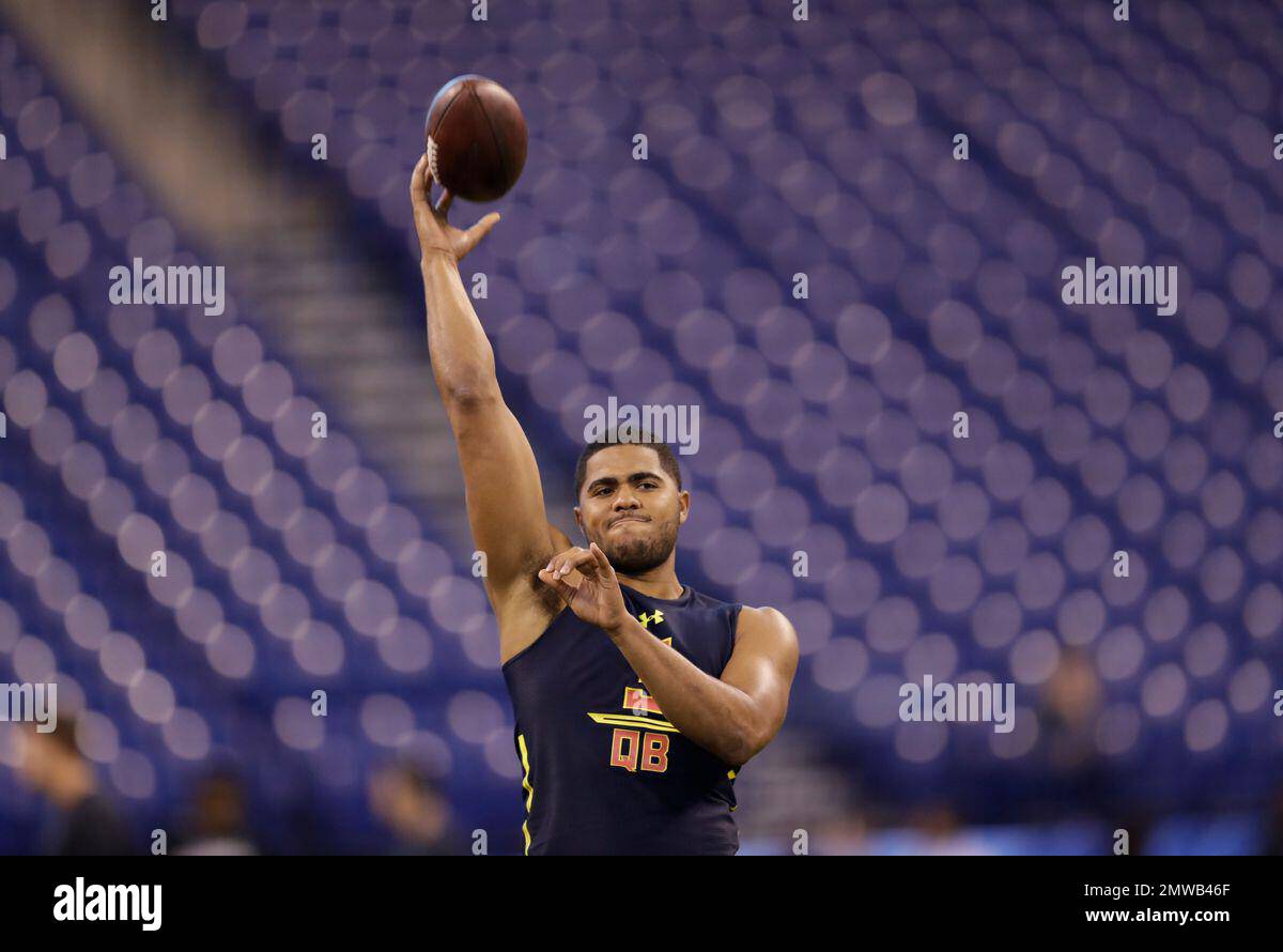 Virginia Tech quarterback Jerod Evans runs a drill at the NFL football ...