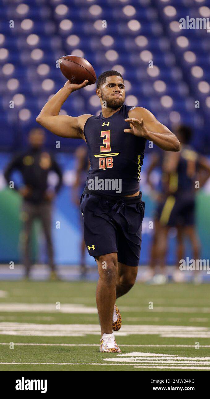 Virginia Tech quarterback Jerod Evans runs a drill at the NFL football ...