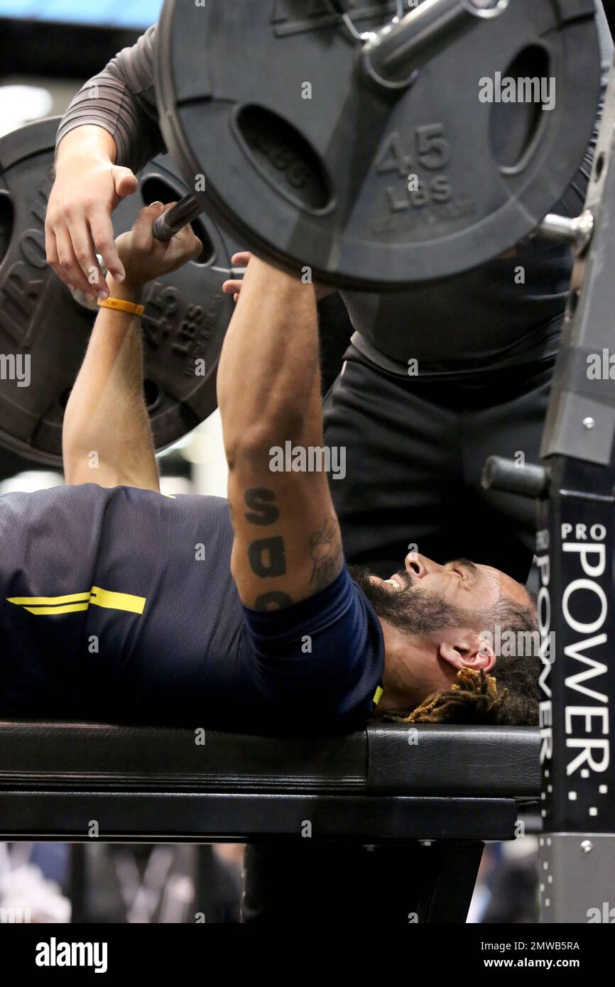 Virginia Tech tight end Bucky Hodges performs the bench press at the ...