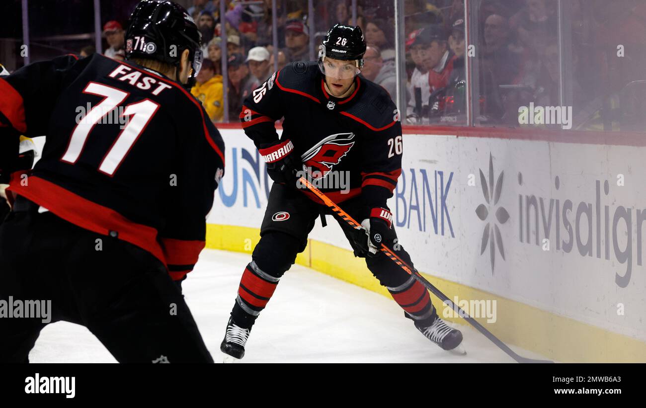 Carolina Hurricanes' Paul Stastny (26) passes the puck to Jesper Fast ...