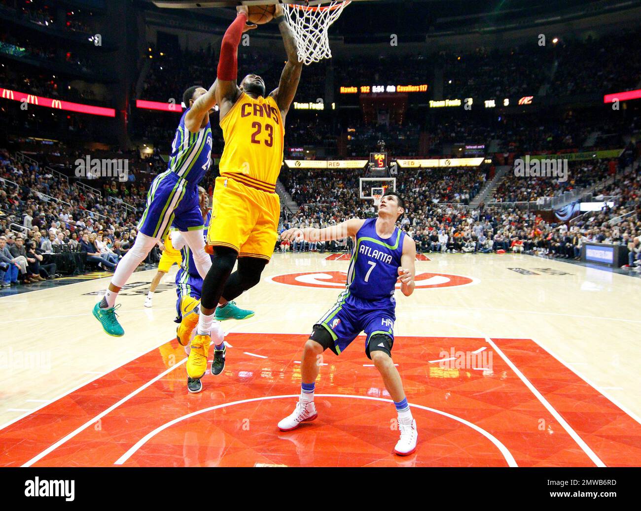 Cleveland Cavaliers forward LeBron James (23) shoots past Atlanta Hawks ...