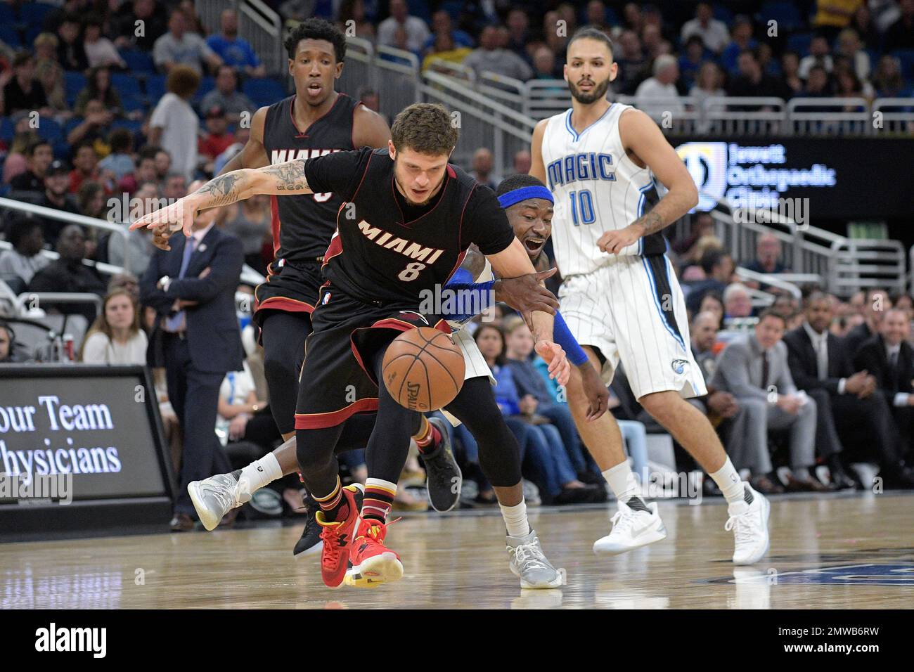 Miami Heat guard Tyler Johnson (8) steals the ball from Orlando Magic ...