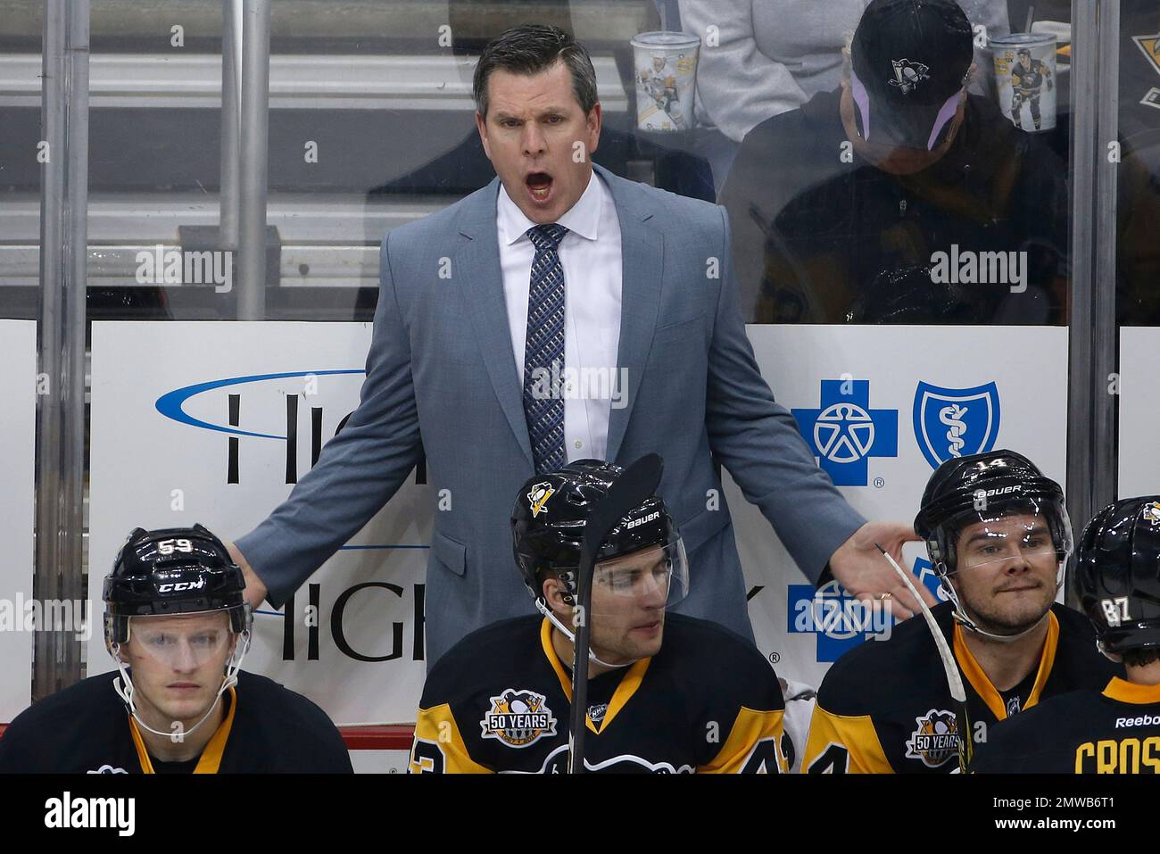 Pittsburgh Penguins head coach Mike Sullivan makes his point to an ...