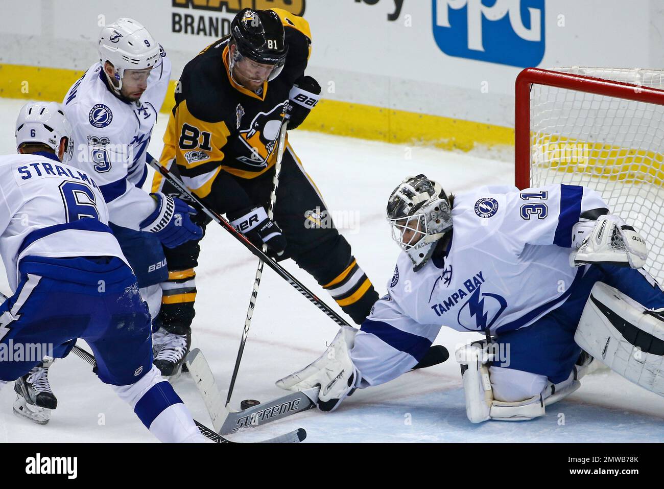 Tampa Bay Lightning goalie Peter Budaj (31) blocks a shot by Pittsburgh ...