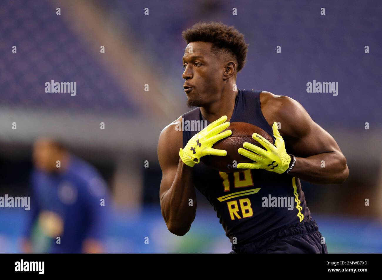 South Florida running back Marlon Mack runs a drill at the NFL football ...