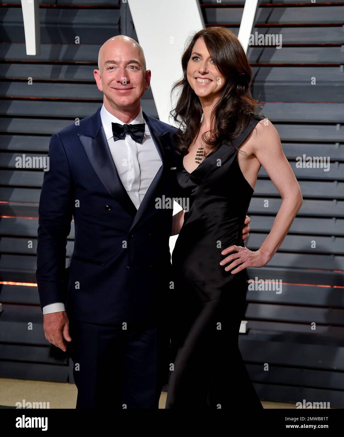 Amazon CEO Jeff Bezos, left, and wife MacKenzie Bezos arrive at the ...