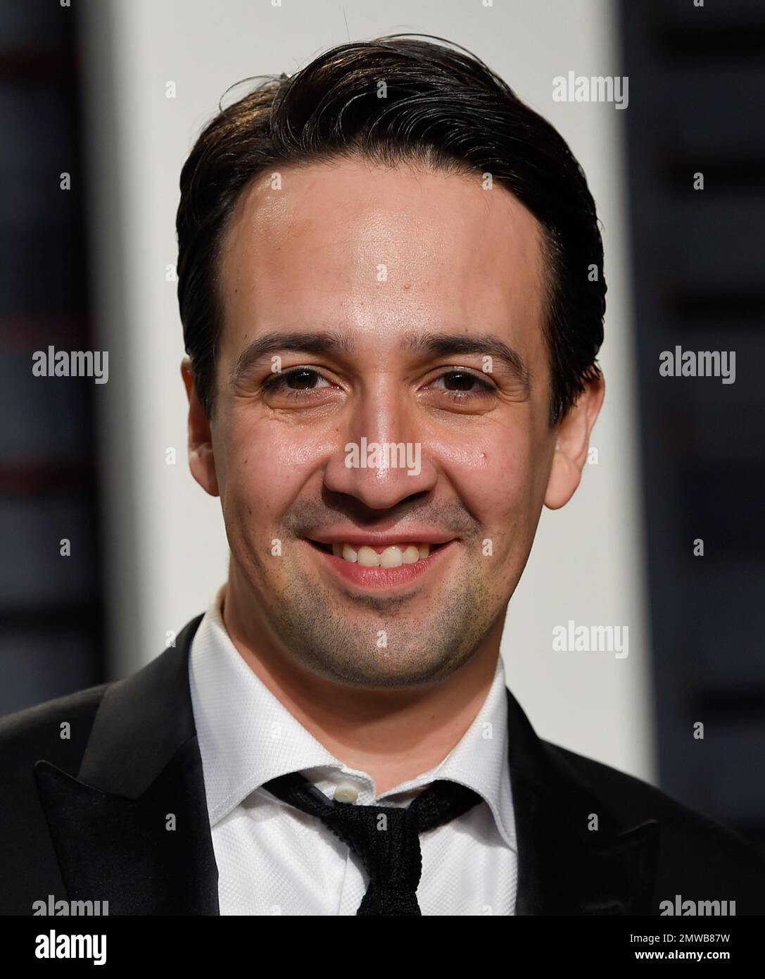 Lin-Manuel Miranda arrives at the Vanity Fair Oscar Party on Monday ...