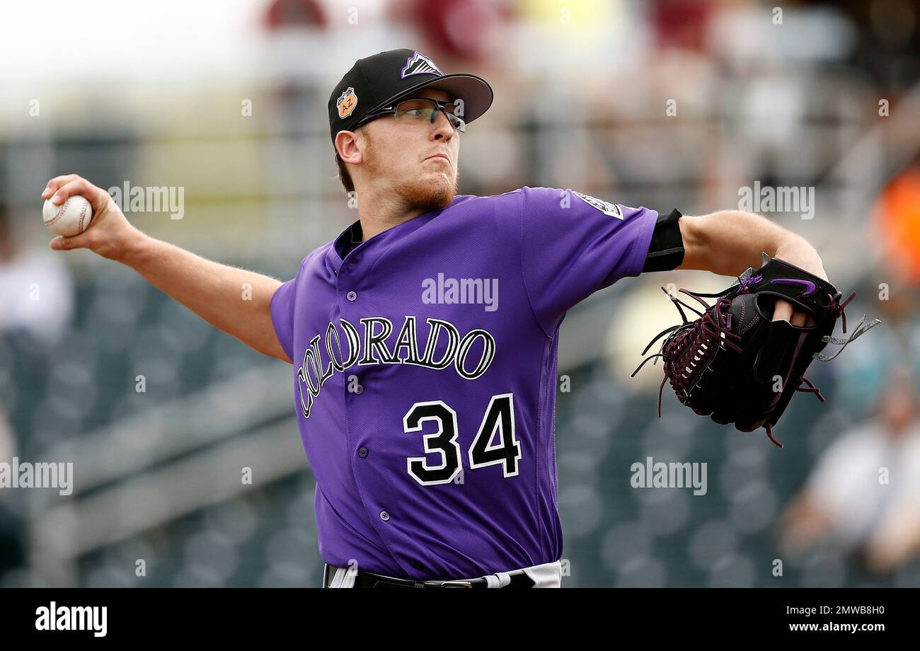 Colorado Rockies starting pitcher Jeff Hoffman throws against the ...