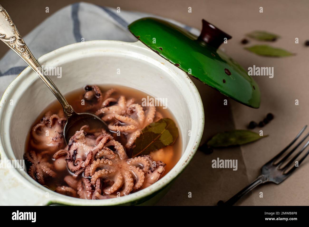 Boiled octopus is in the casserole. Pulpo a la Gallega (Galician-style ...