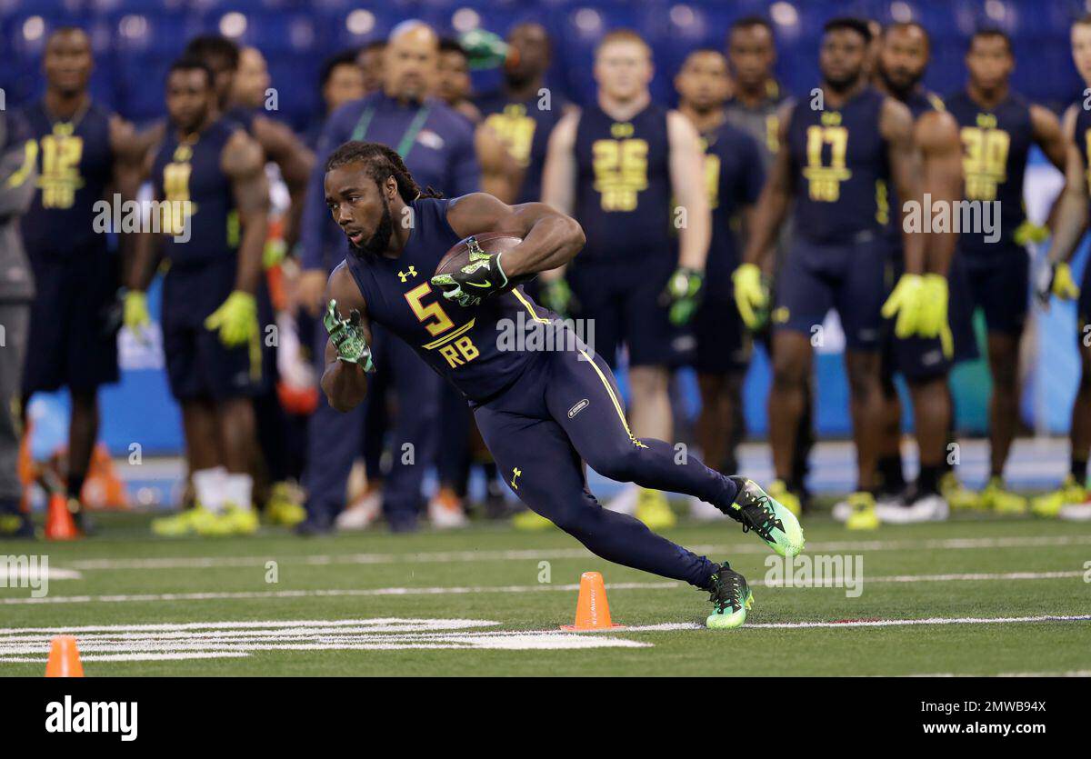 Florida State running back Dalvin Cook runs a drill at the NFL football ...