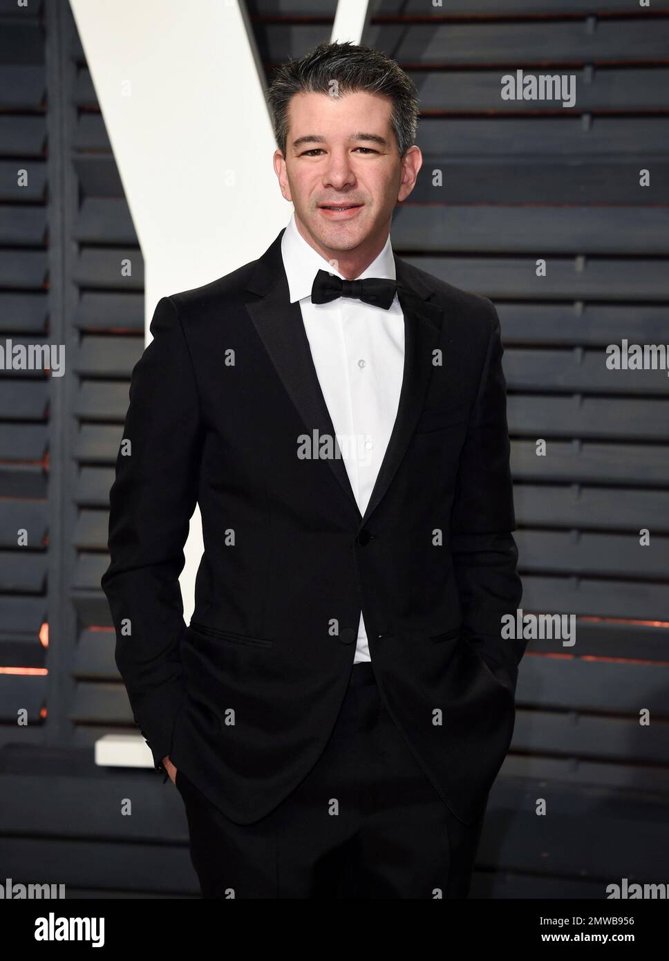 Uber CEO Travis Kalanick arrives at the Vanity Fair Oscar Party on ...