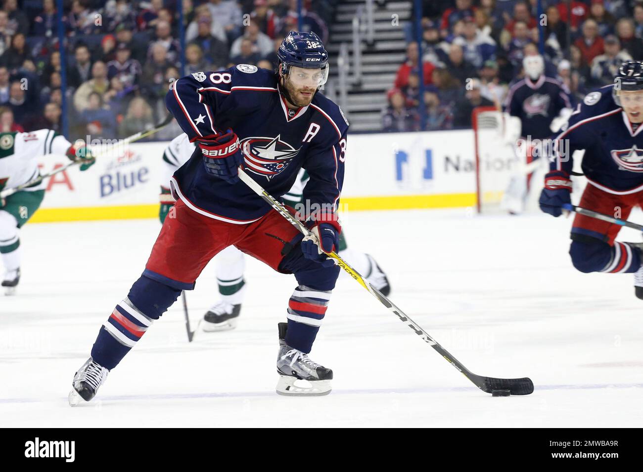Columbus Blue Jackets' Boone Jenner plays against the Minnesota Wild ...
