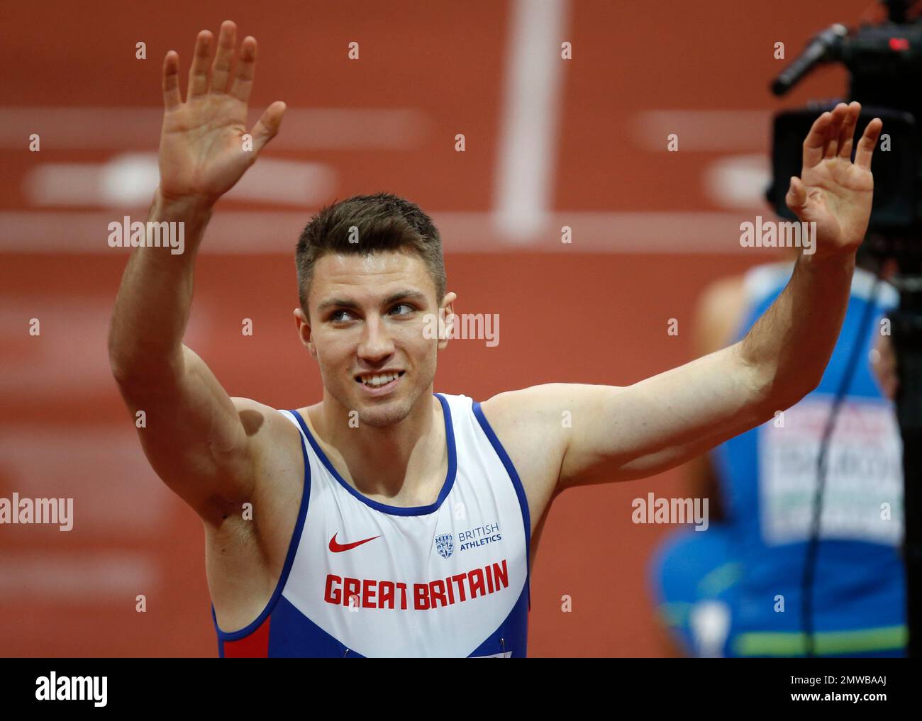 Britain's Andy Pozzi celebrates winning the men's 60-meter hurdles ...