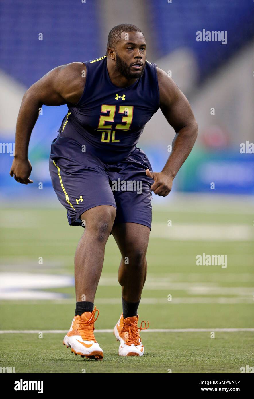 Miami offensive lineman Danny Isidora runs a drill at the NFL football ...