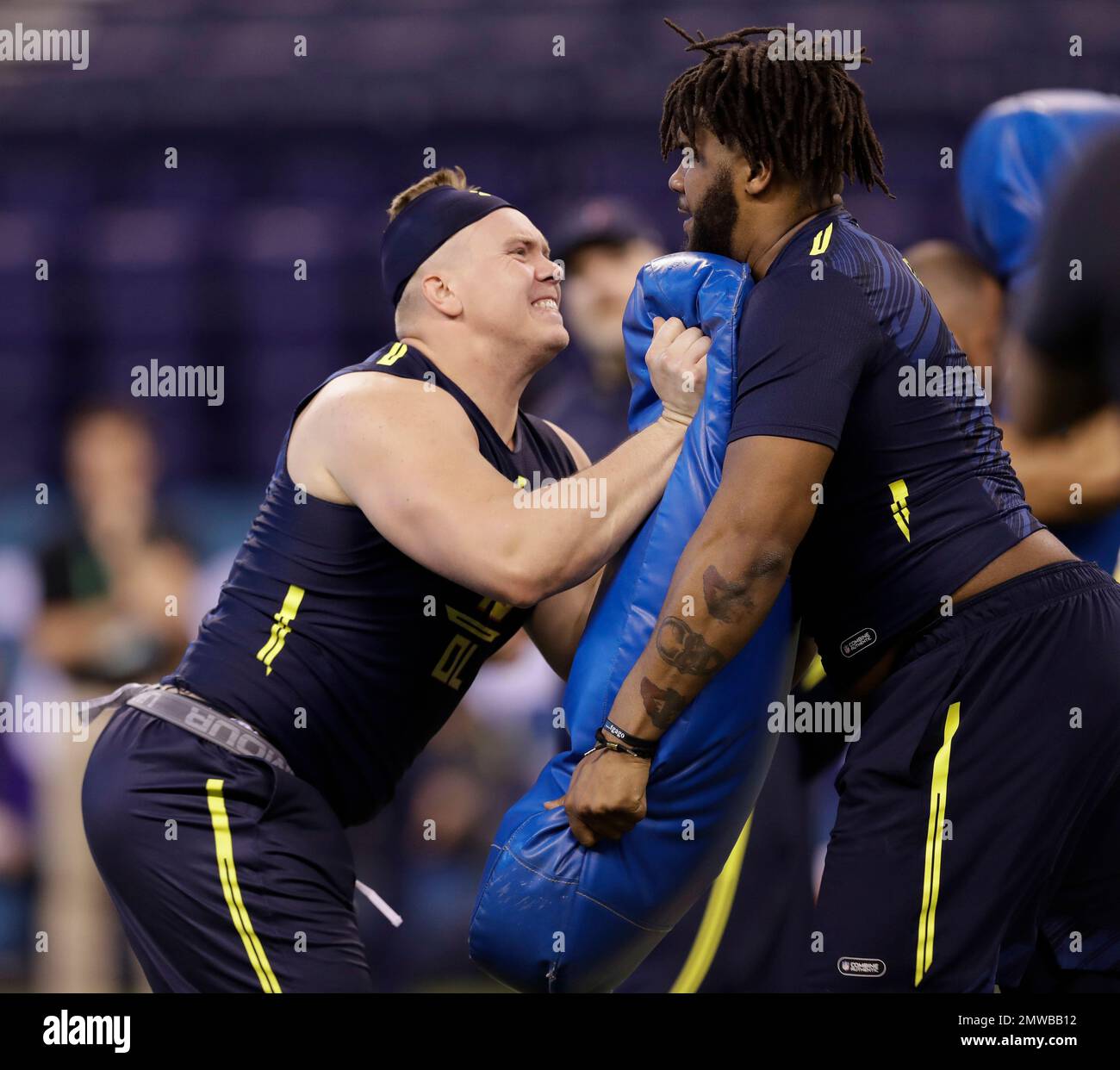 Ohio State offensive lineman Pat Elflein runs a drill at the NFL ...