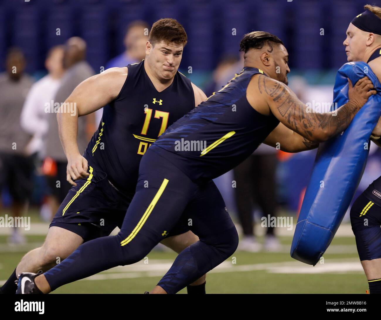 Indiana offensive lineman Dan Feeney runs a drill at the NFL football ...