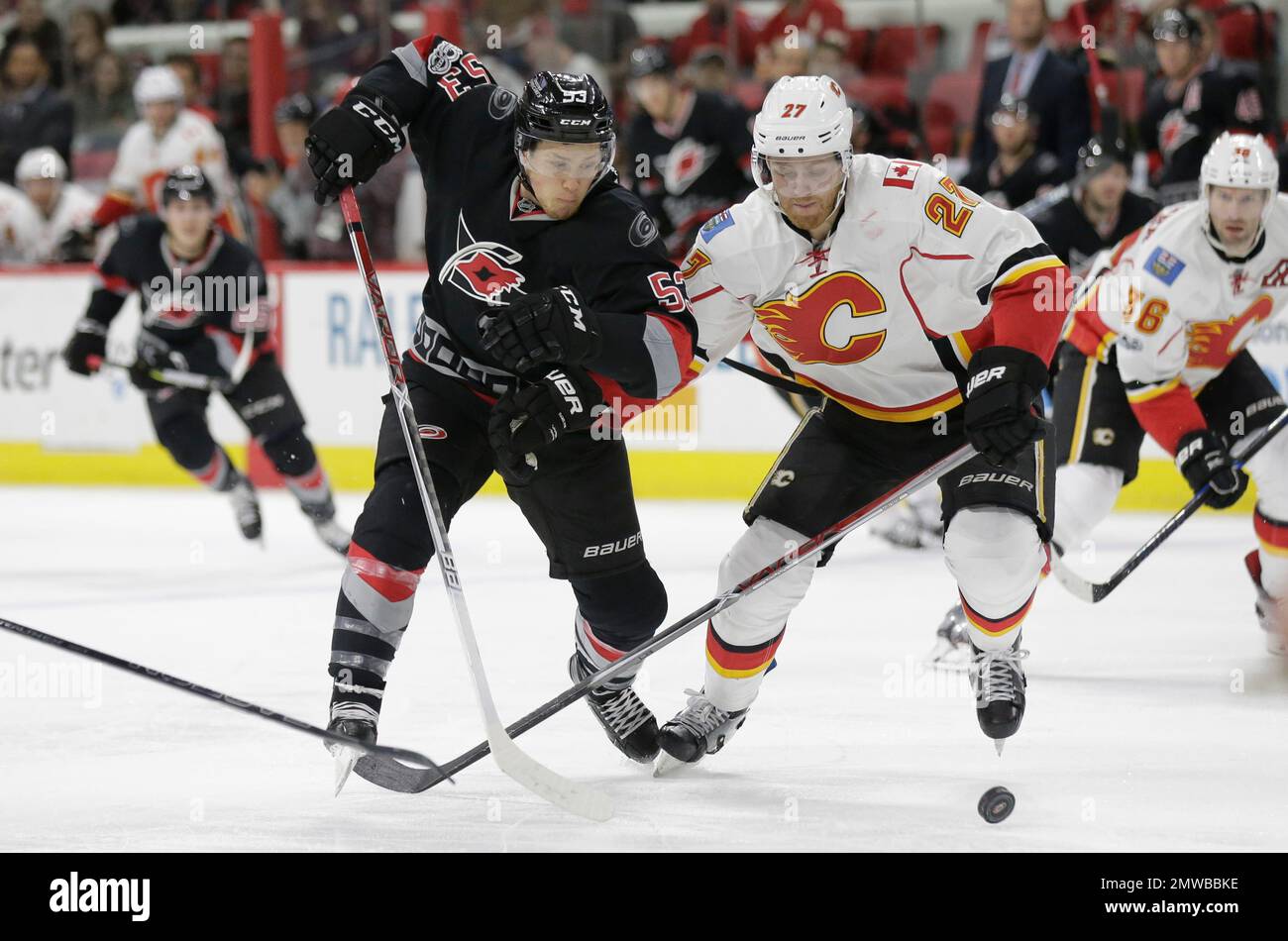 Calgary Flames' Dougie Hamilton (27) and Carolina Hurricanes' Jeff ...