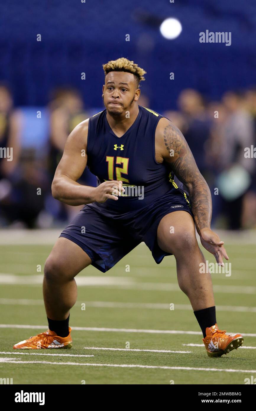 Temple offensive lineman Dion Dawkins runs a drill at the NFL football ...