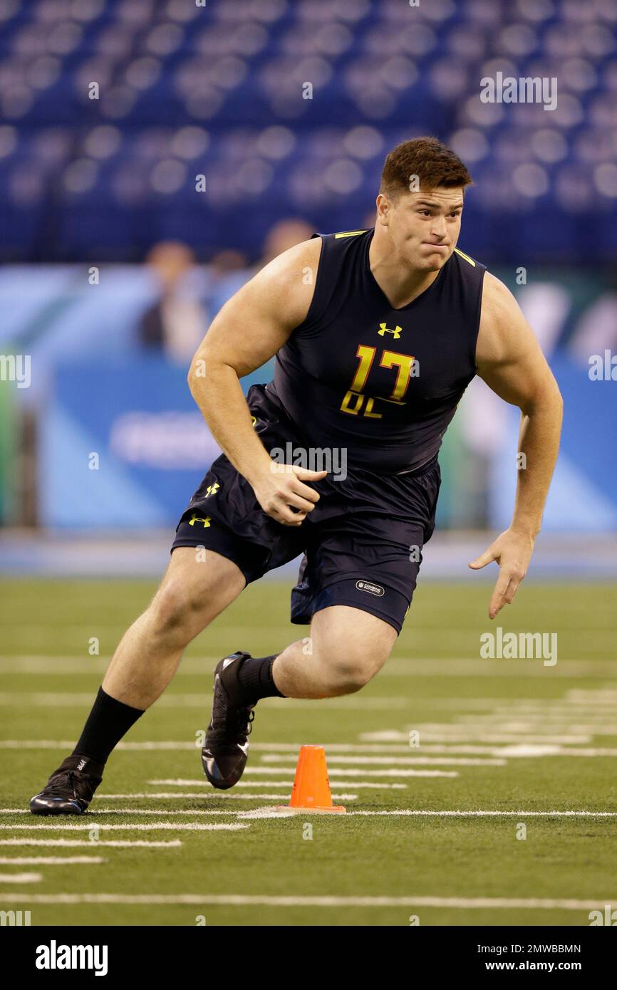 Indiana offensive lineman Dan Feeney runs a drill at the NFL football ...