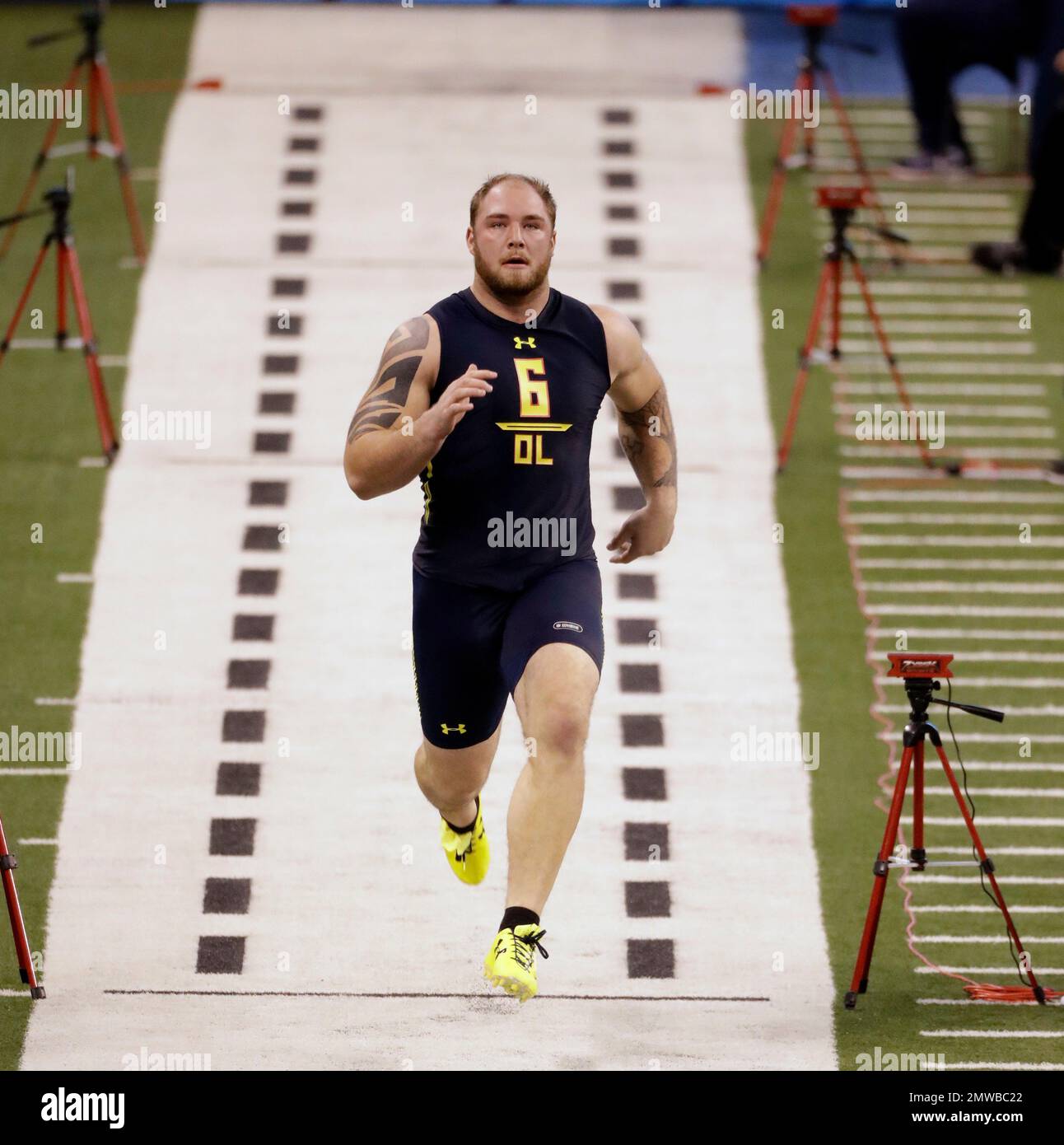 Michigan offensive lineman Ben Braden runs the 40-yard dash at the NFL ...