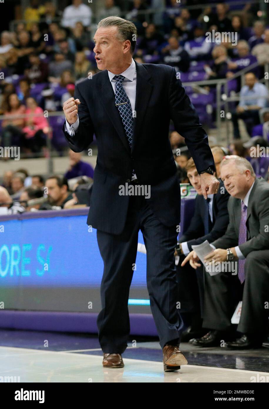 TCU head coach Jamie Dixon instructs his team during an NCAA college ...