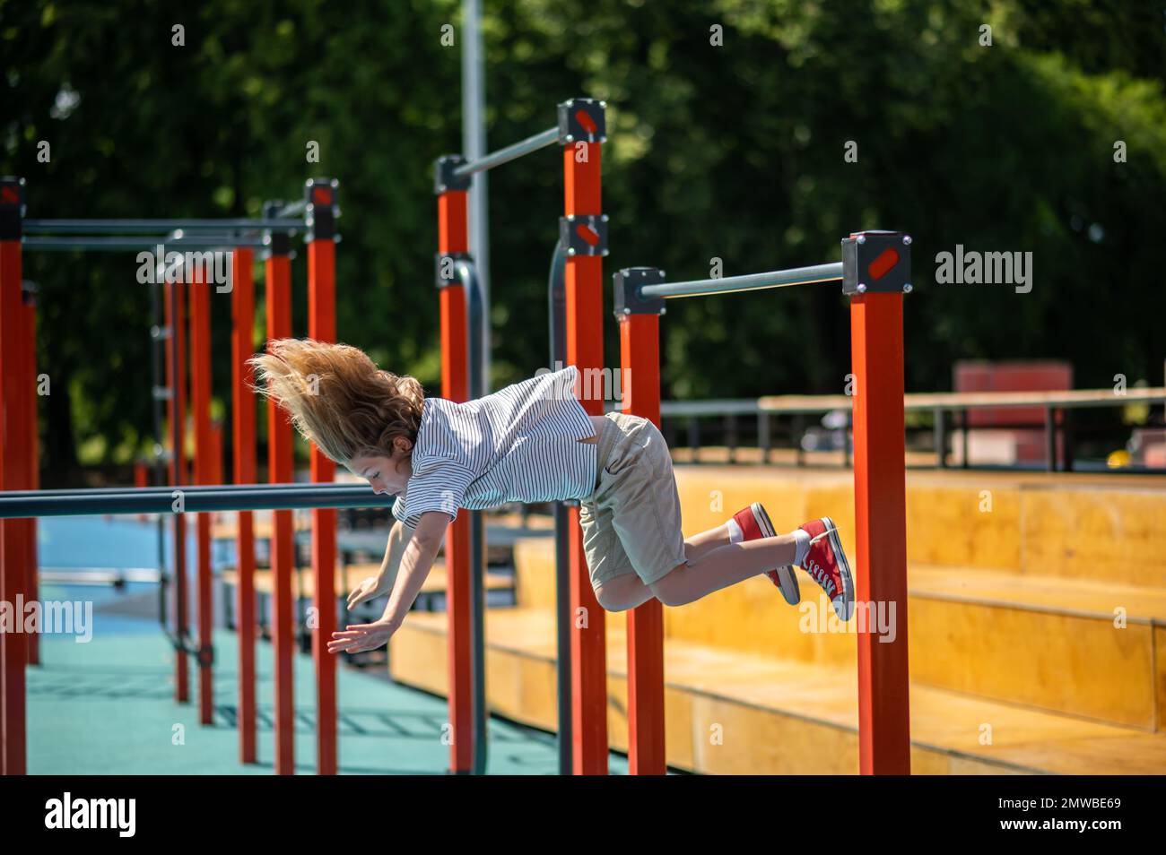 Child jumping up athletics hi-res stock photography and images - Alamy