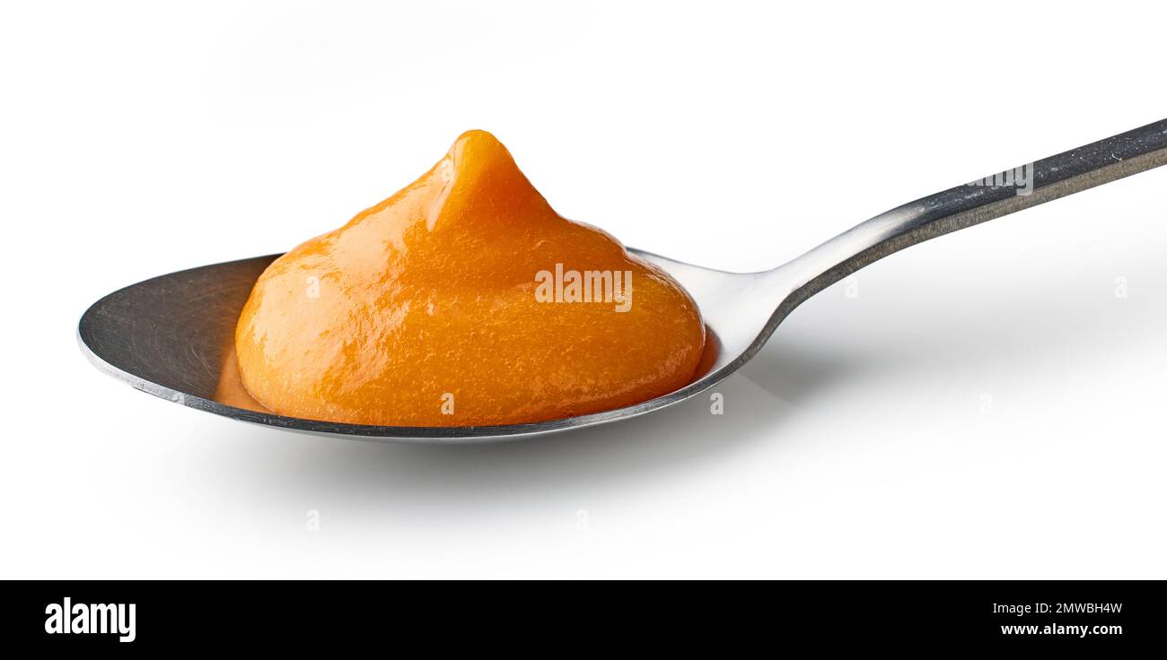 spoon of vegetable puree isolated on white background Stock Photo - Alamy
