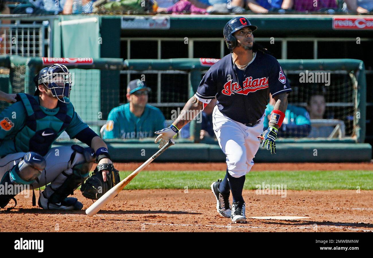 Cleveland Indians second baseman Michael Martinez, right, watches the ...