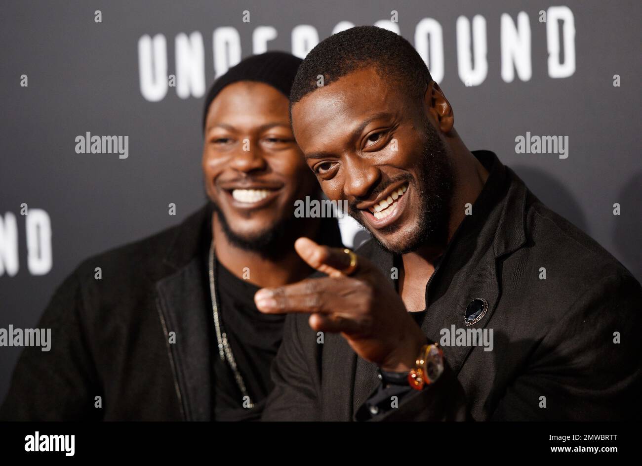 Aldis Hodge, right, a cast member in "Underground," poses with his ...