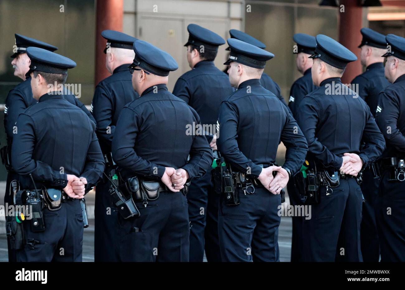 Los Angeles police officers stand at role call prior to a ceremony ...