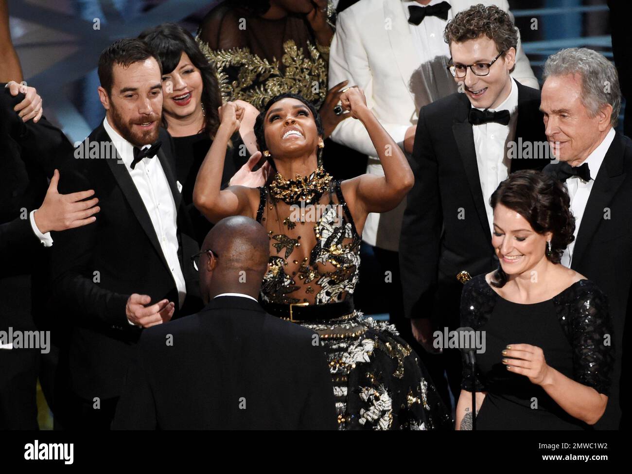 "Moonlight" cast member Janelle Monae, center, reacts onstage after the ...