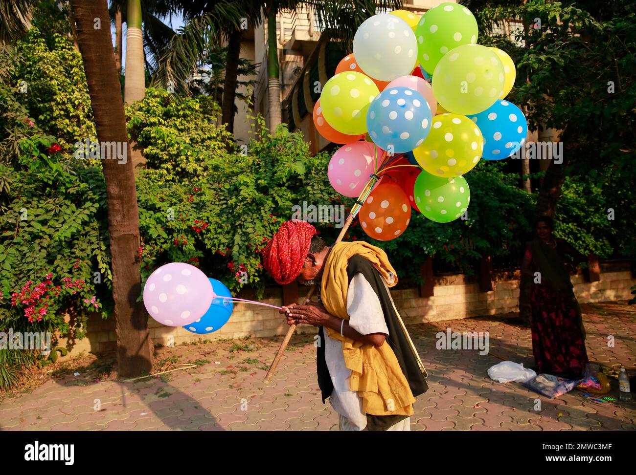A balloon vendor from northern Indian state of Rajasthan after ...