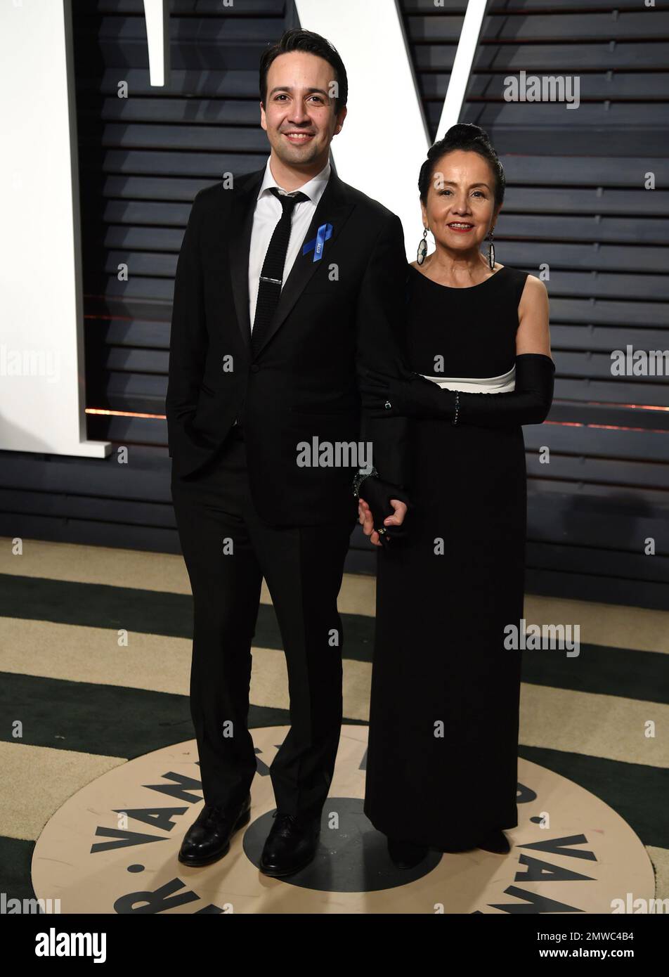 Lin-Manuel Miranda, left, and Luz Towns-Miranda arrives at the Vanity ...