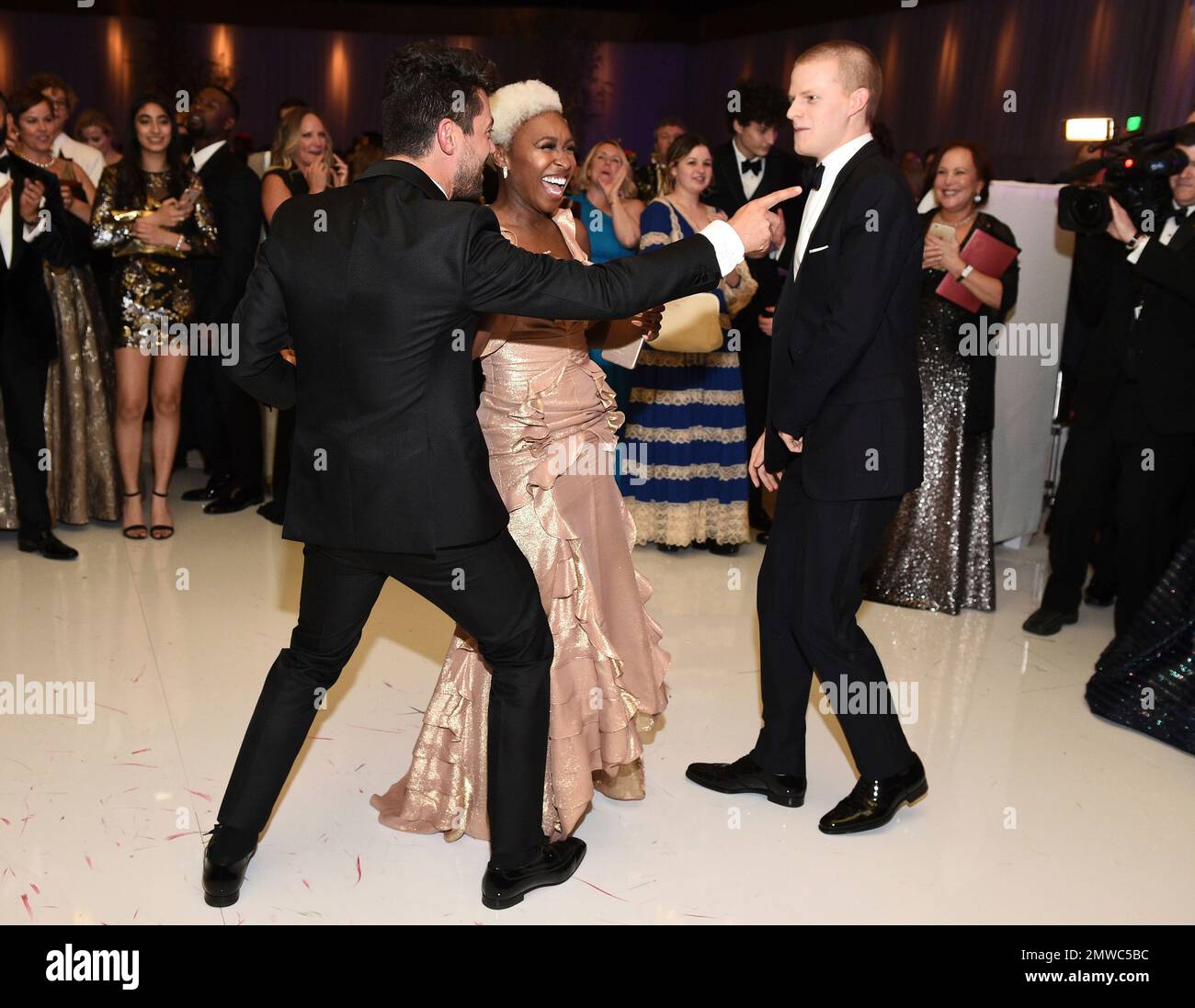 Dominic Cooper, from left, Cynthia Erivo and Lucas Hedges seen dancing ...