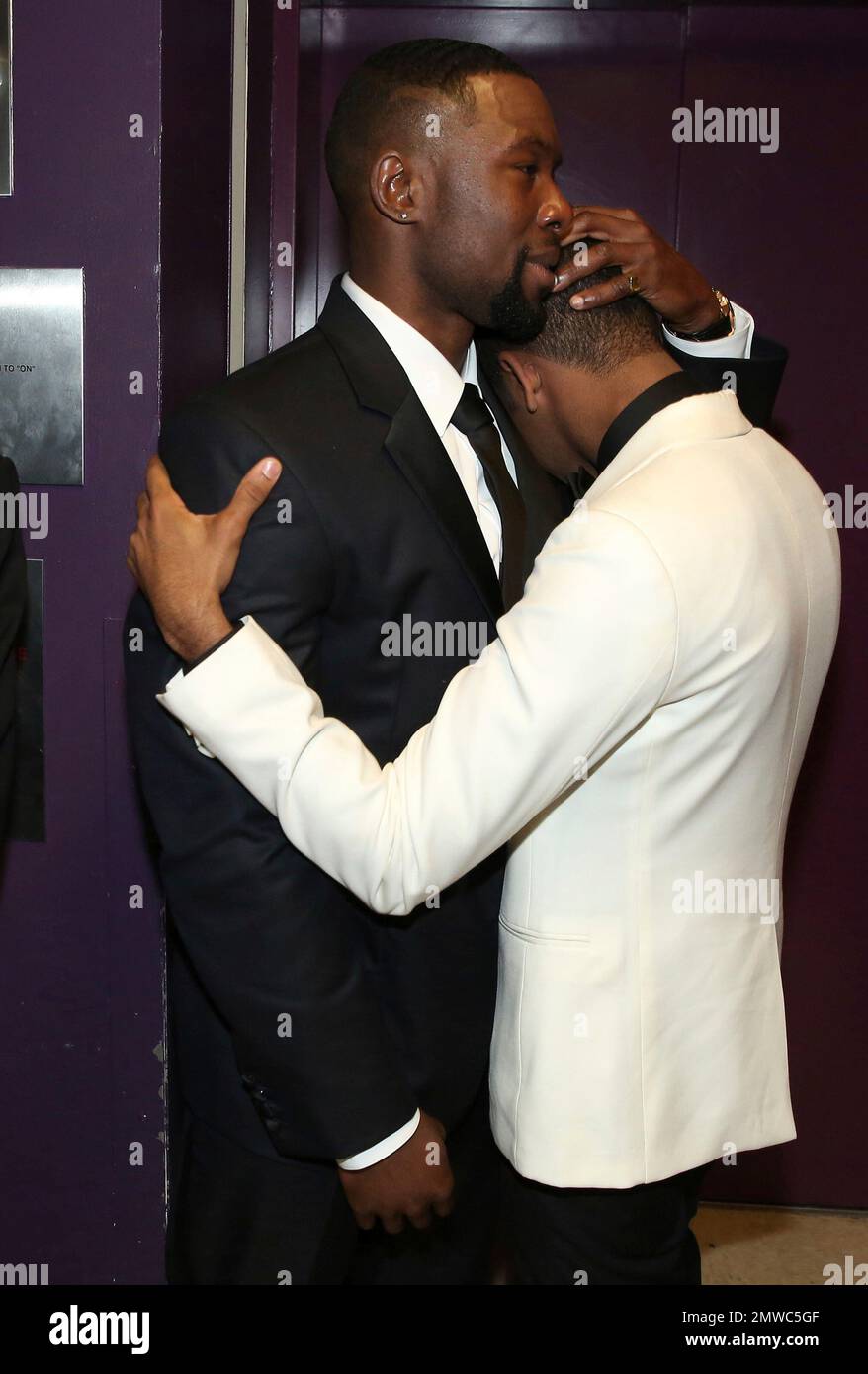 Trevante Rhodes, left, and Jharrel Jerome embrace backstage at the ...