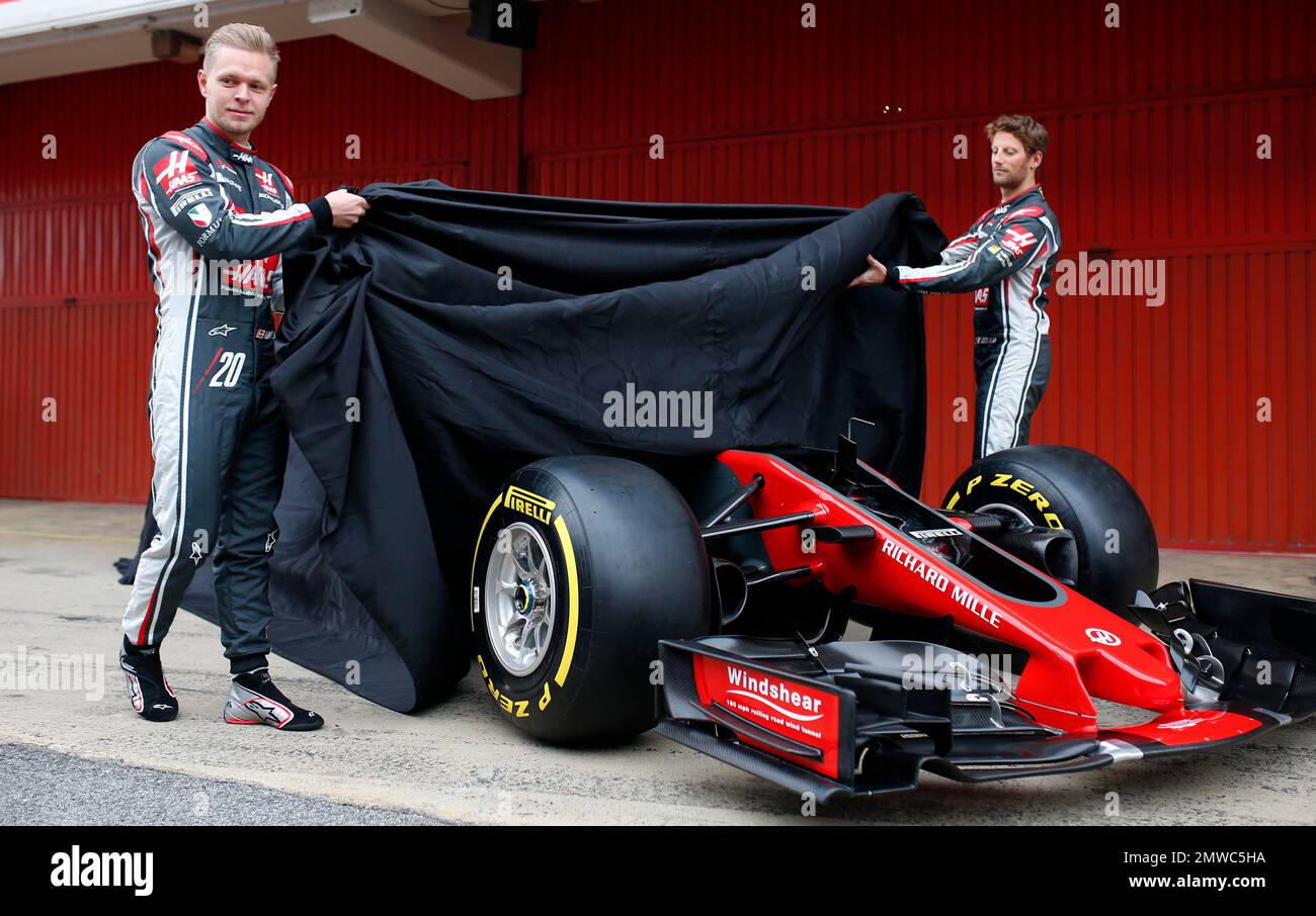 Race drivers Kevin Magnussen of Denmark, left, and Romain Grosjean of ...