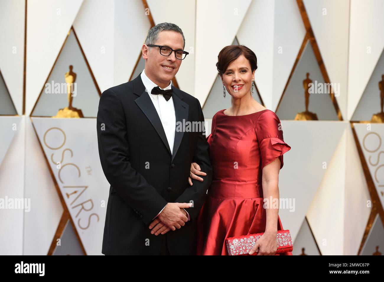 Rodrigo Prieto, left, and Monica Prieto arrive at the Oscars on Sunday ...