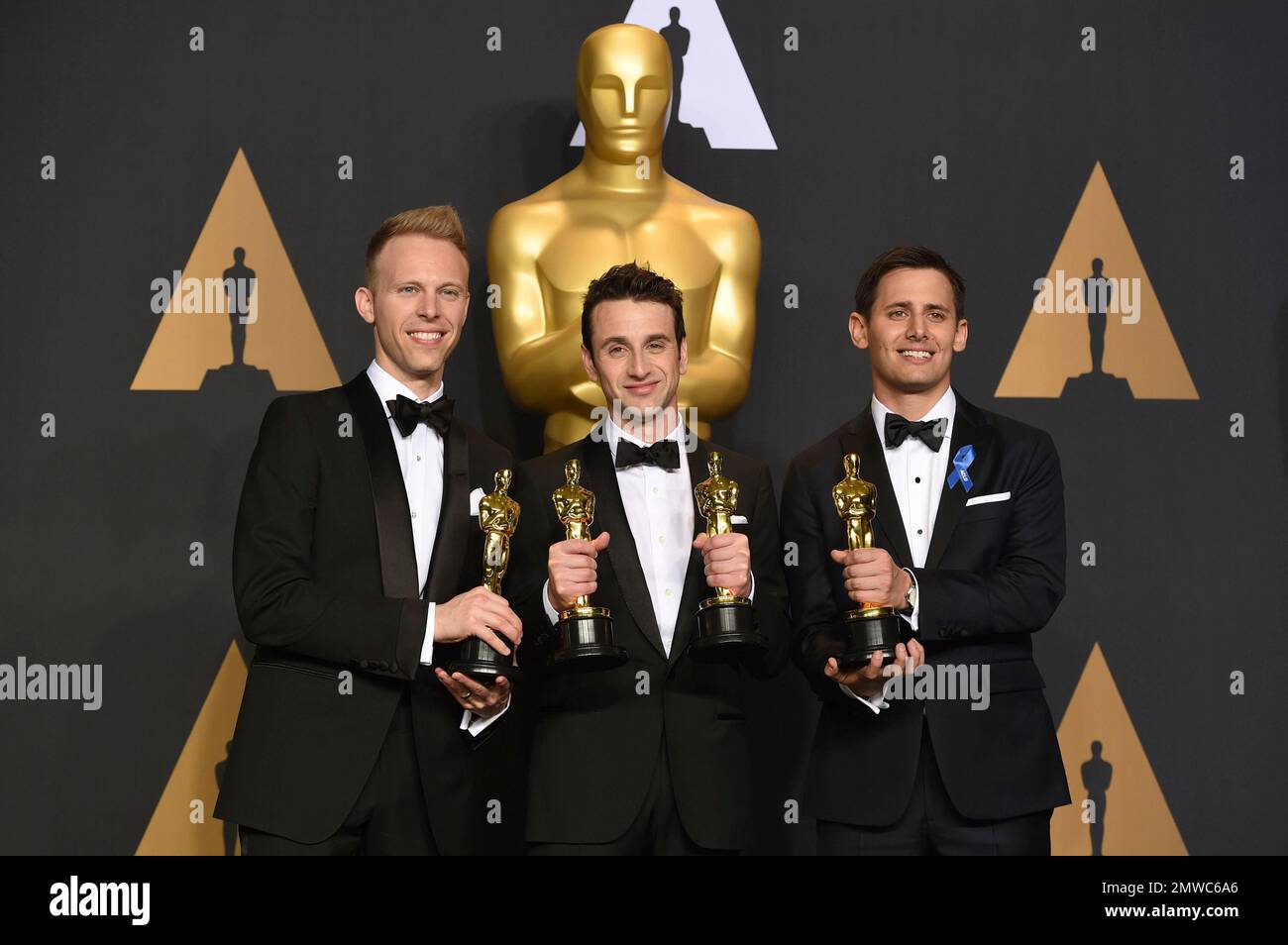 Justin Paul, from left, Justin Hurwitz and Benj Pasek, winners of the award for best original ...