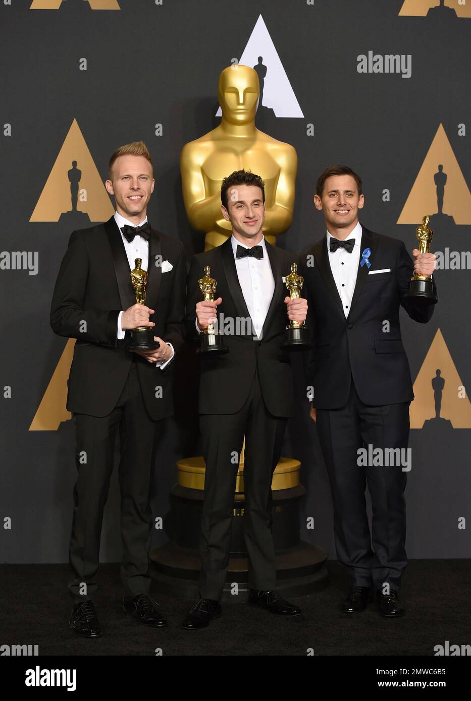Justin Paul, from left, Justin Hurwitz and Benj Pasek, winners of the award for best original ...