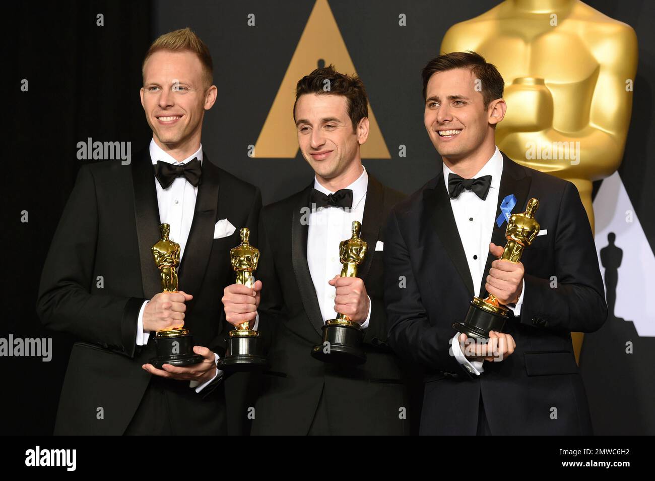 Justin Paul, from left, Justin Hurwitz and Benj Pasek, winners of the award for best original ...