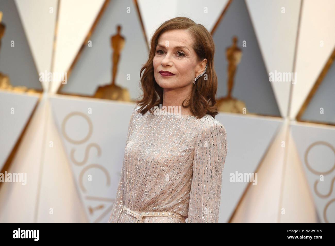 Isabelle Huppert arrives at the Oscars on Sunday, Feb. 26, 2017, at the ...