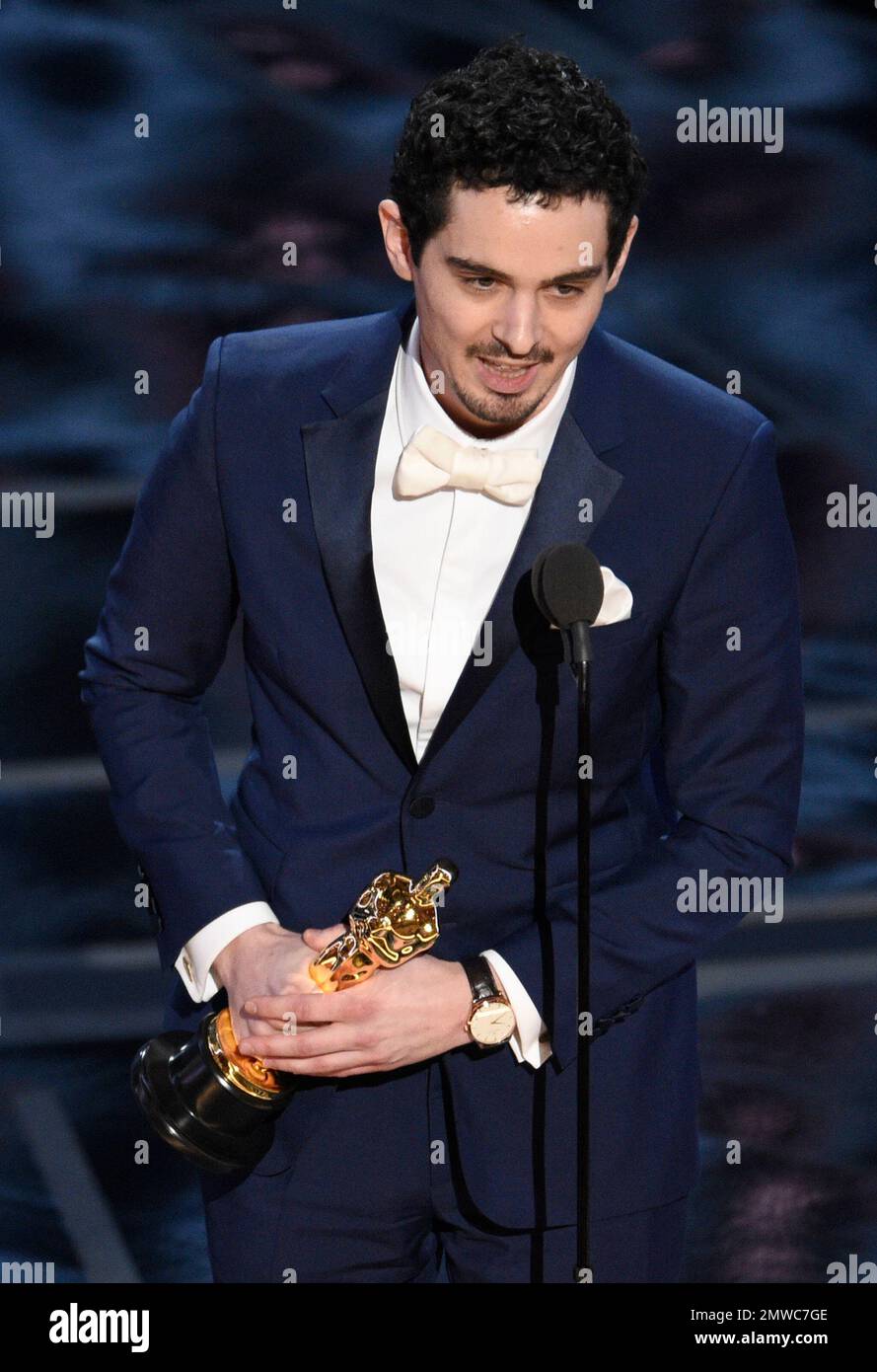 Damien Chazelle accepts the award for best director for "La La Land" at ...